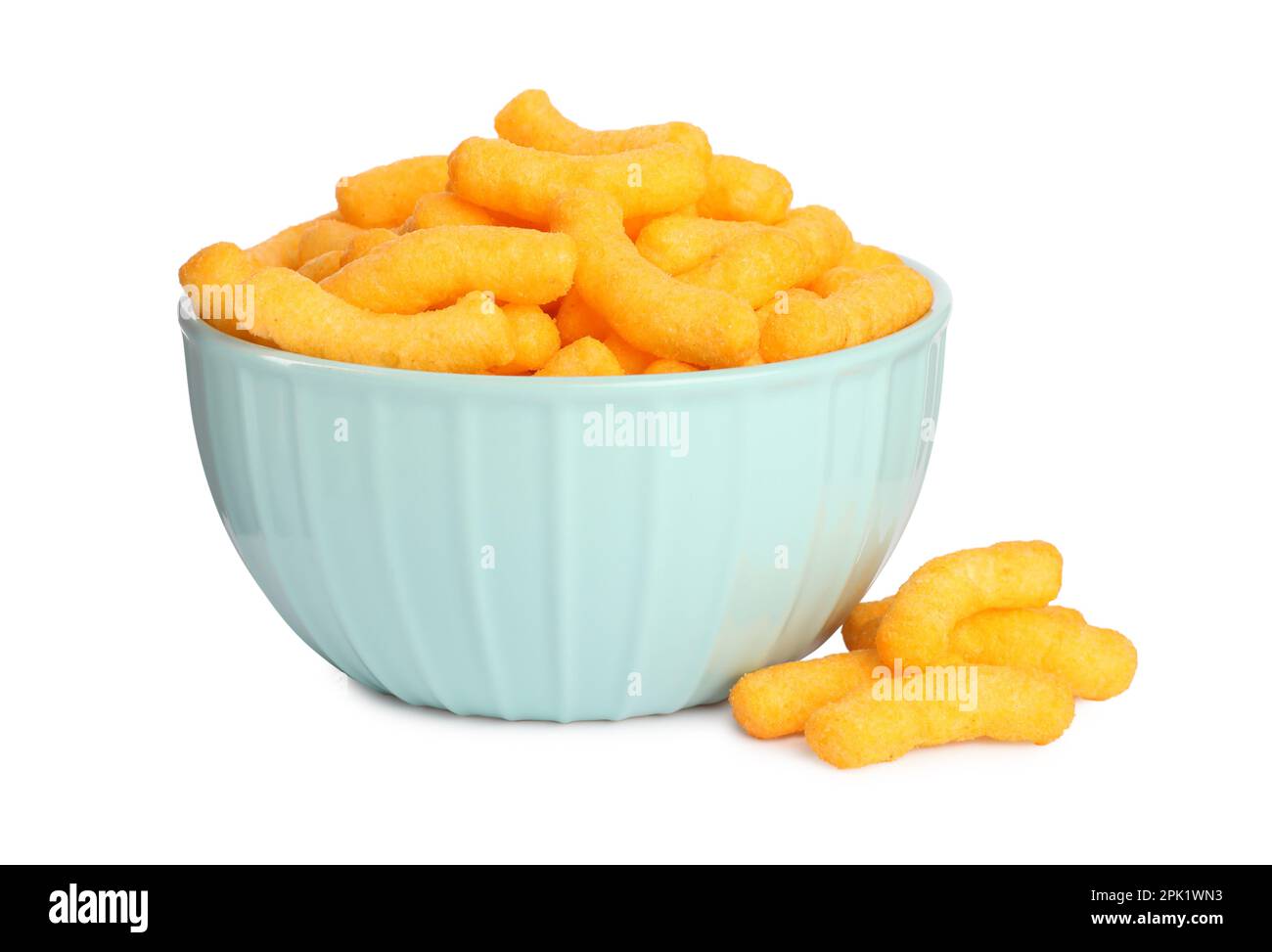 Many tasty cheesy corn puffs in bowl isolated on white Stock Photo - Alamy