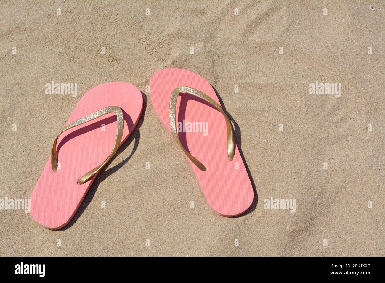 Golden flip flops hi-res stock photography and images - Alamy