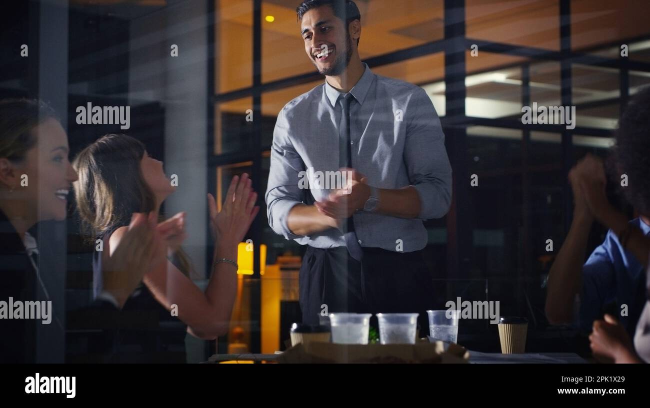 We can do this together. a diverse group of businesspeople clapping ...