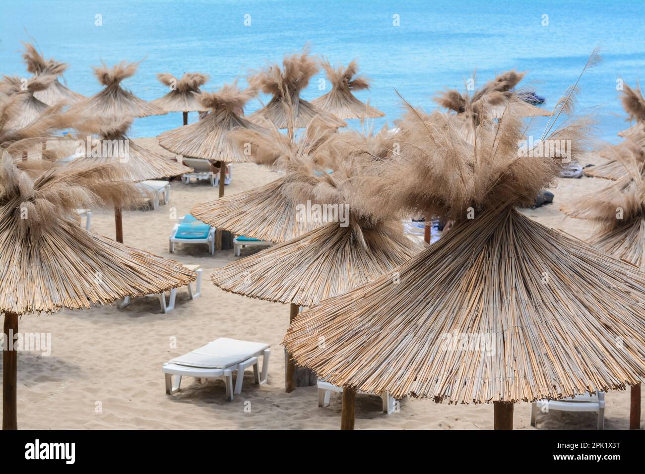 Straw umbrellas beach near hi-res stock photography and images - Alamy