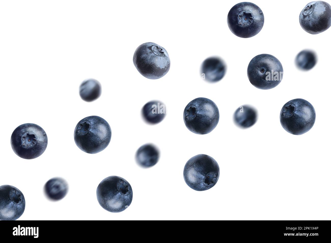 Tasty ripe blueberries flying on white background Stock Photo - Alamy