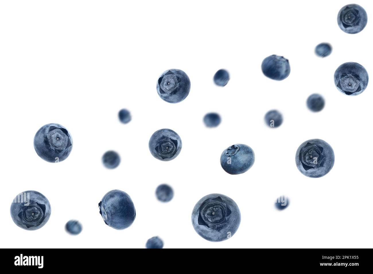 Tasty ripe blueberries flying on white background Stock Photo - Alamy