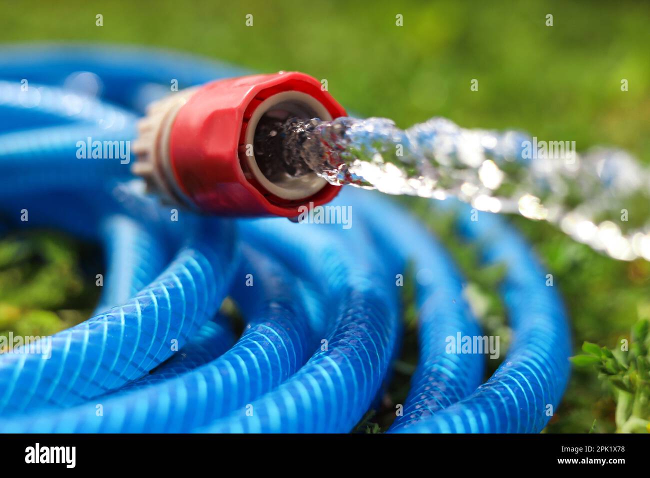 Water flowing from watering hi-res stock photography and images - Alamy