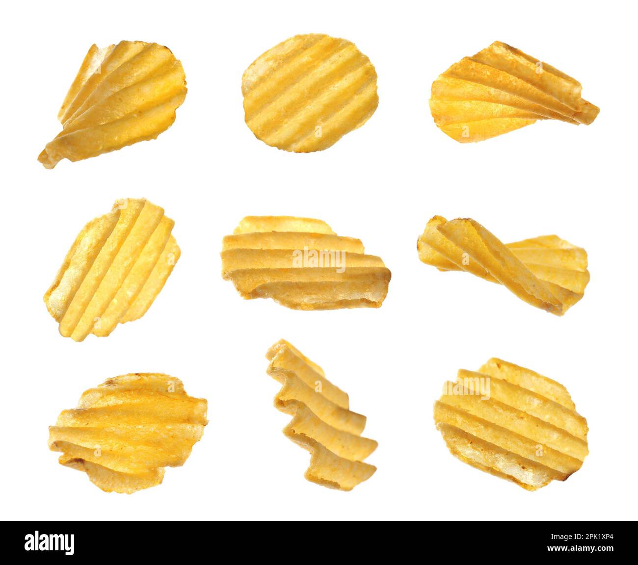 Set of ridged crispy potato chips on white background Stock Photo - Alamy