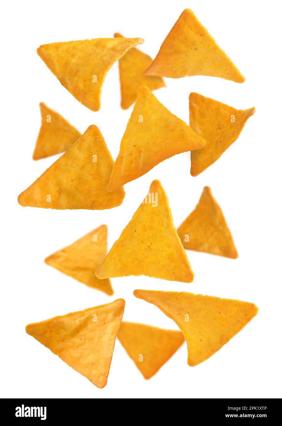Tasty tortilla chips (nachos) falling into on white background Stock ...