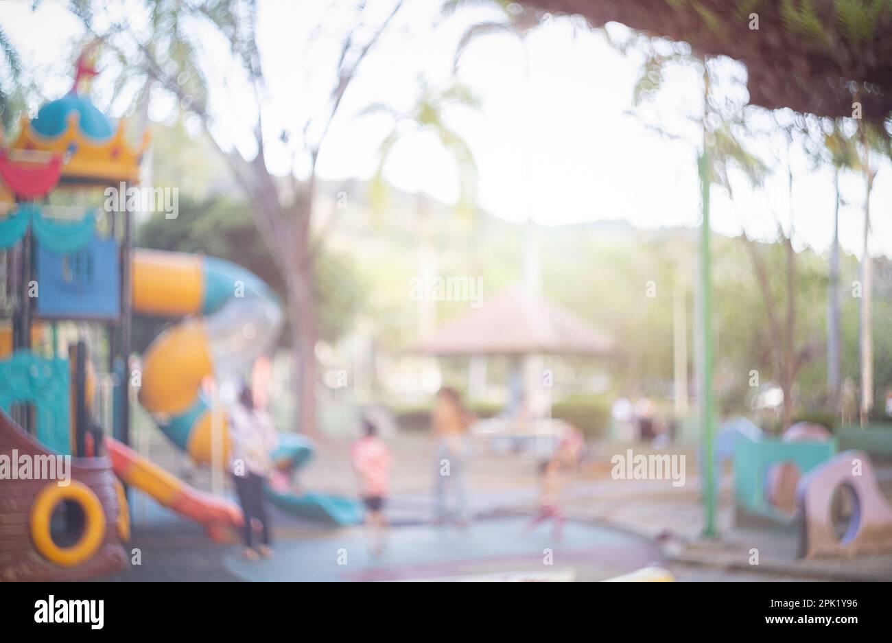 Blurry Green background Blur public playground park, Daycare in nature outdoor in light foliage ...