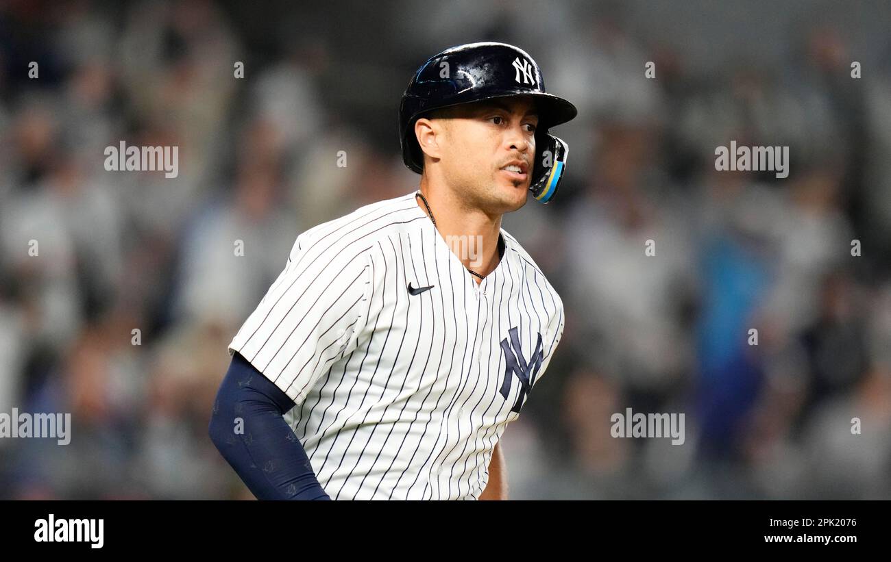 New York Yankees' Giancarlo Stanton reacts after hitting a fly out ... New York Yankees' Giancarlo Stanton reacts after hitting a fly out ...