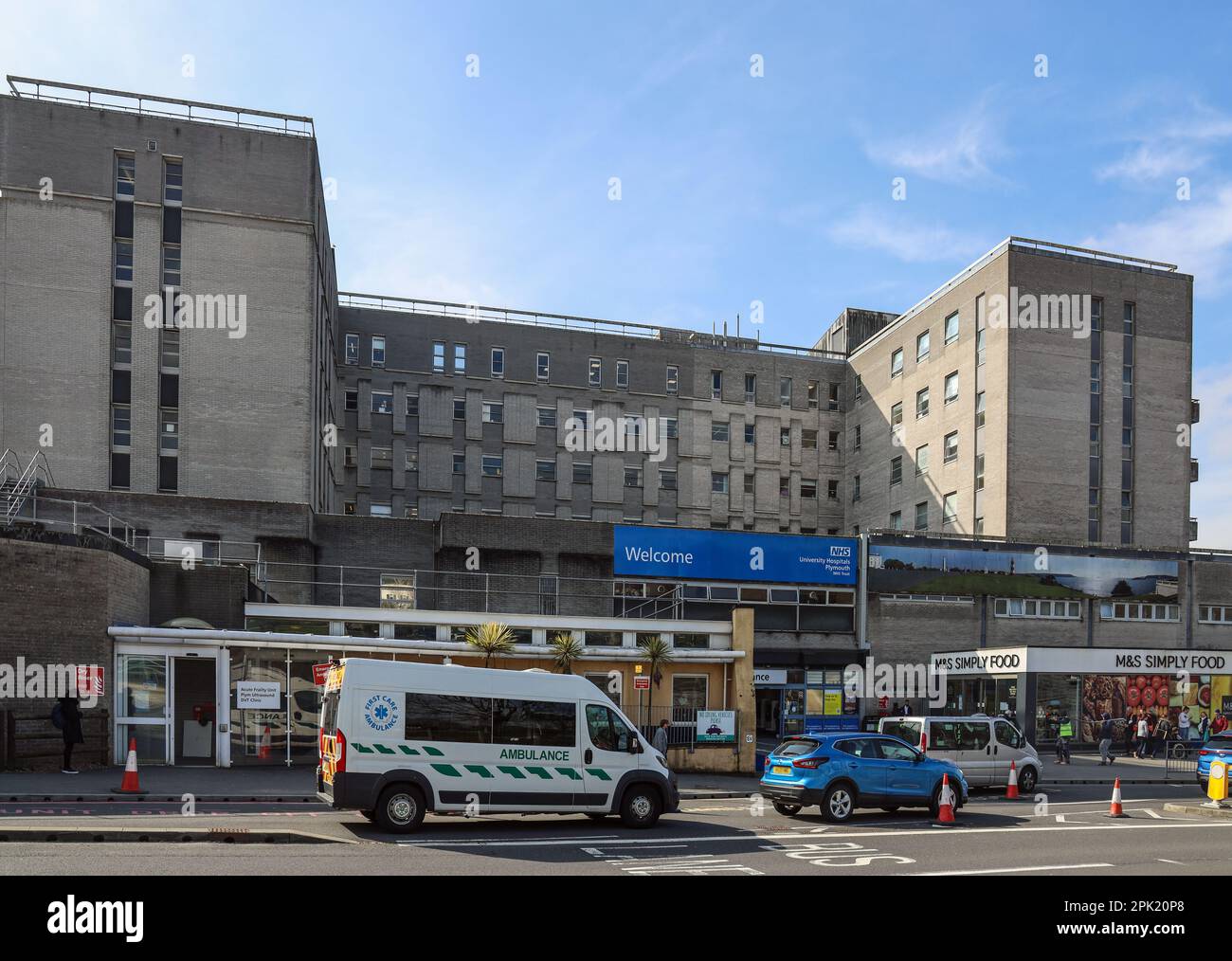A First Care white ambulance outside of the main entrance to Derriford ...