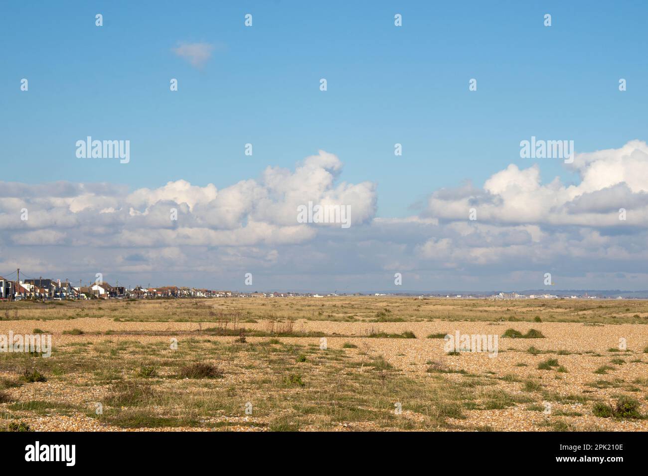 The vast expanse of the wild and remote Dungeness shingle beach spreads ...