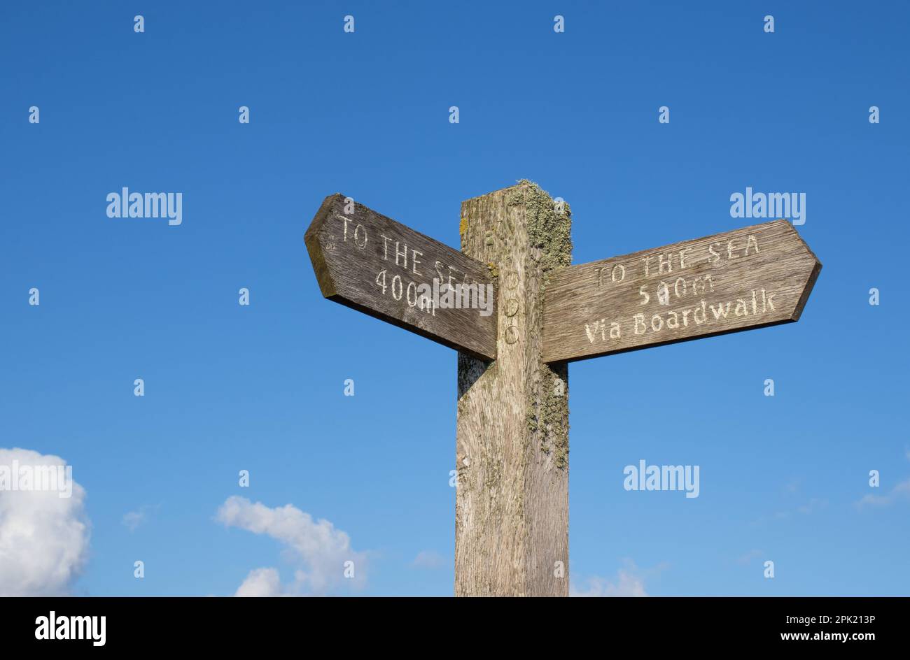 A coastal sign at the seaside reading "To The Sea" and "To The Sea Via ...