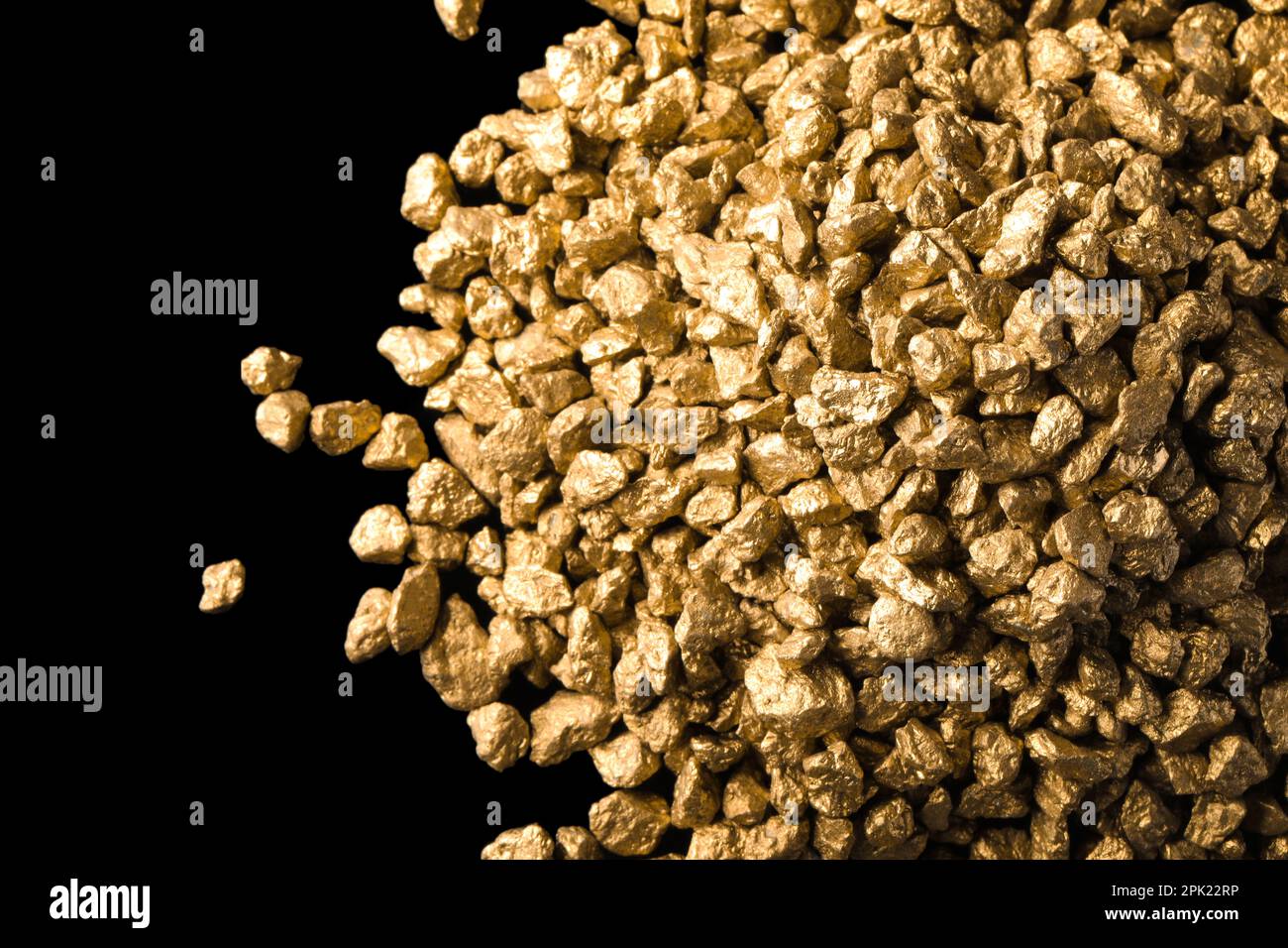 Pile of gold nuggets on black background, flat lay Stock Photo - Alamy