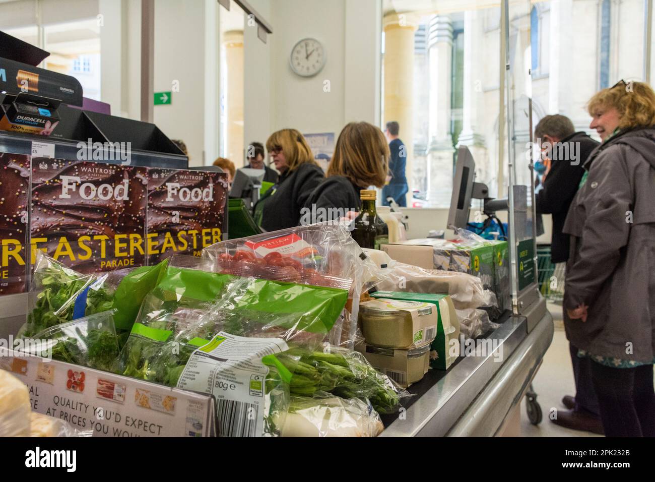 Customers at the check out in Waitrose supermarket, Bath, Somerset ...