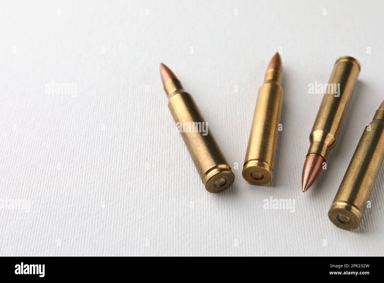 Bullets on white background, closeup. Space for text Stock Photo - Alamy