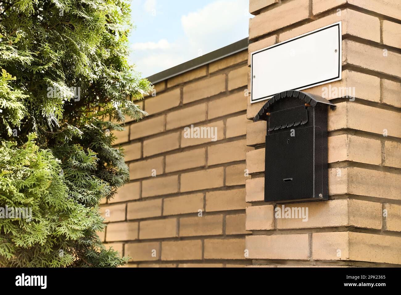 Vintage letter box on beige brick wall outdoors, space for text Stock ...