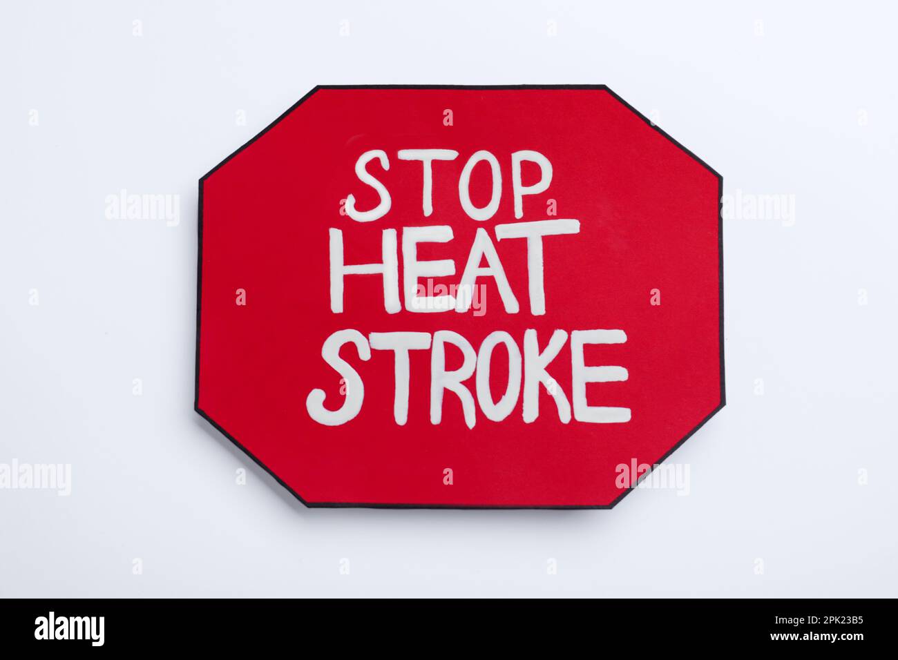 Sign with phrase Stop Heat Stroke on white background, top view Stock ...