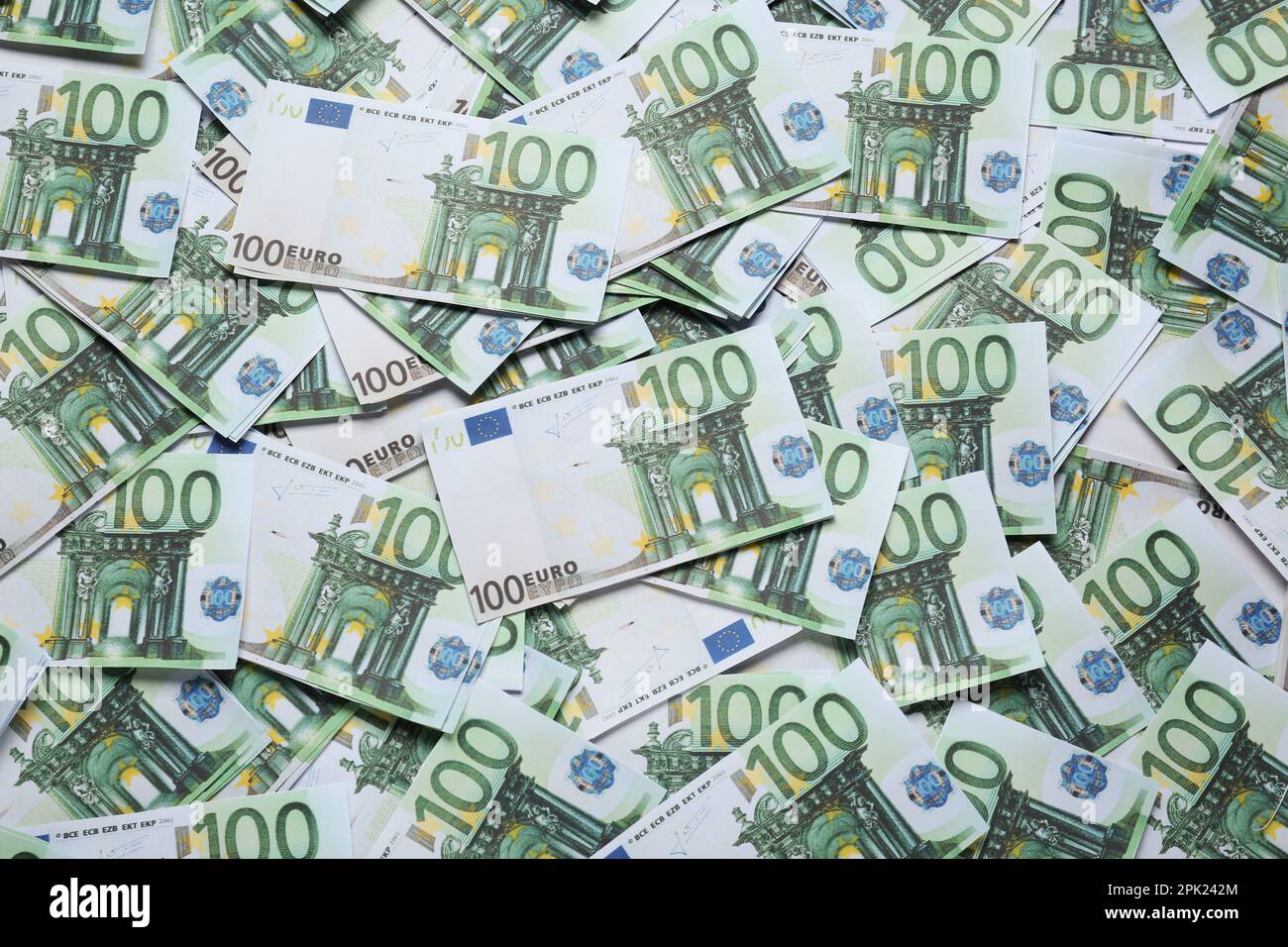 100 Euro banknotes as background, top view. Money exchange Stock Photo ...