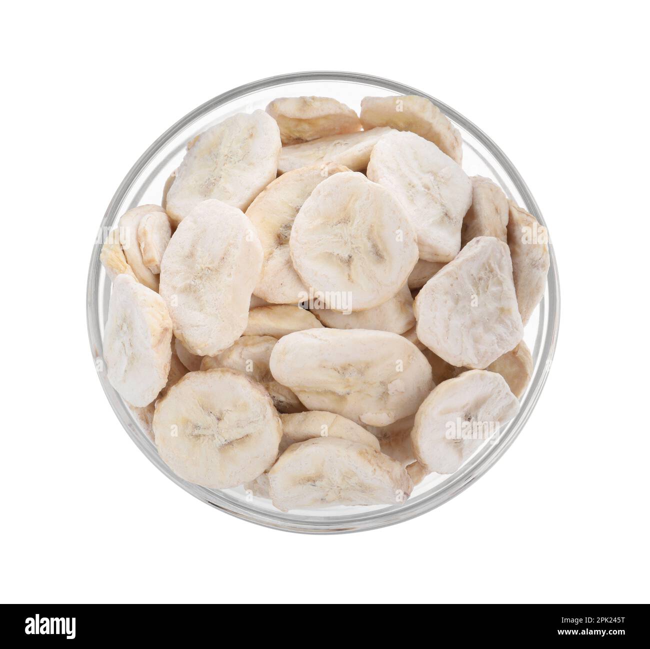 Freeze dried bananas in bowl on white background, top view Stock Photo ...