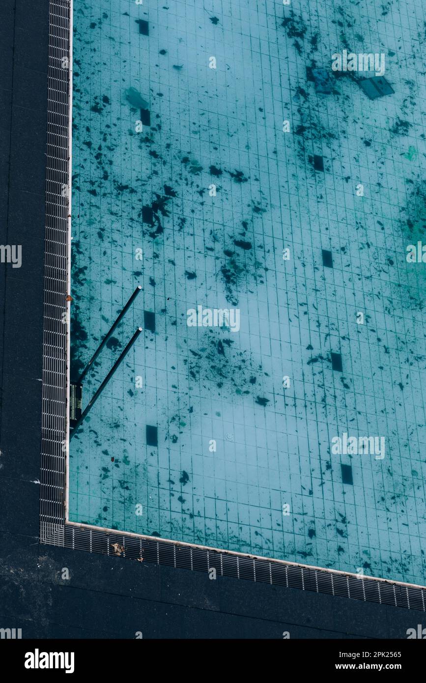 Dirty rough swimming pool which need to be cleaned Stock Photo - Alamy