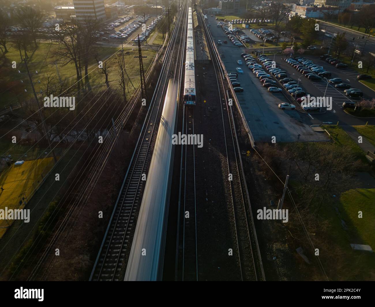 Aerial view of a train moving along a track in bright sunlight Stock ...