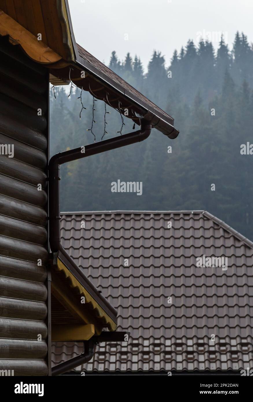 Holder gutter drainage system on the roof. Drain on the roof of the ...