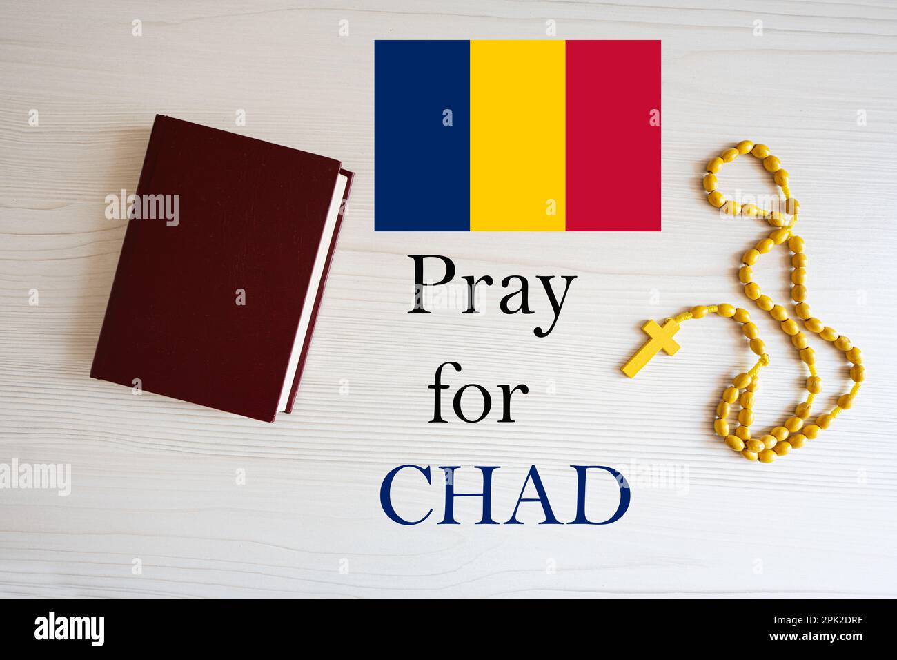 Pray for Chad. Rosary and Holy Bible background Stock Photo - Alamy