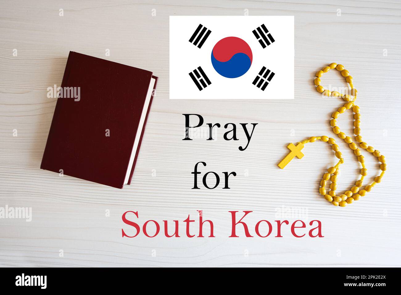 Pray for South Korea. Rosary and Holy Bible background Stock Photo - Alamy