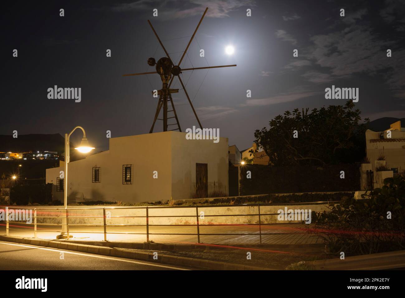 Old windmill in the moonlight, night photography Stock Photo - Alamy