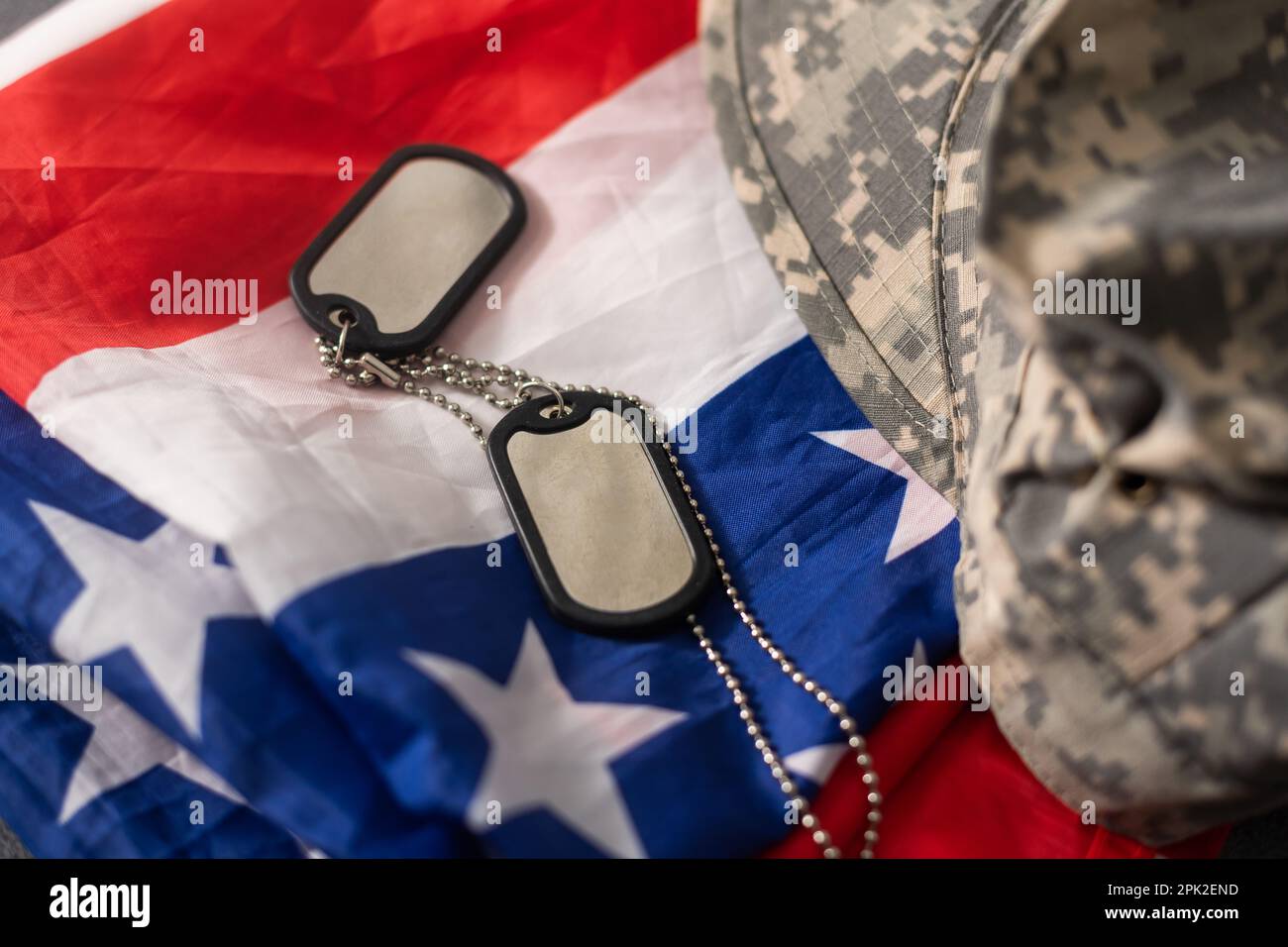 Army tokens on military uniform and USA national flag background Stock ...