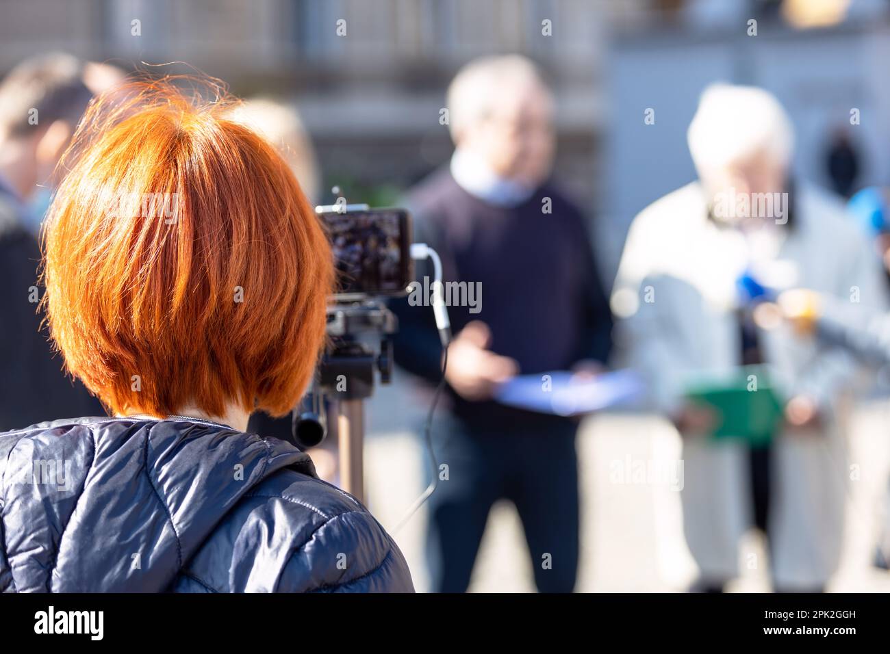 Filming media event or news conference with smartphone. Mobile ...