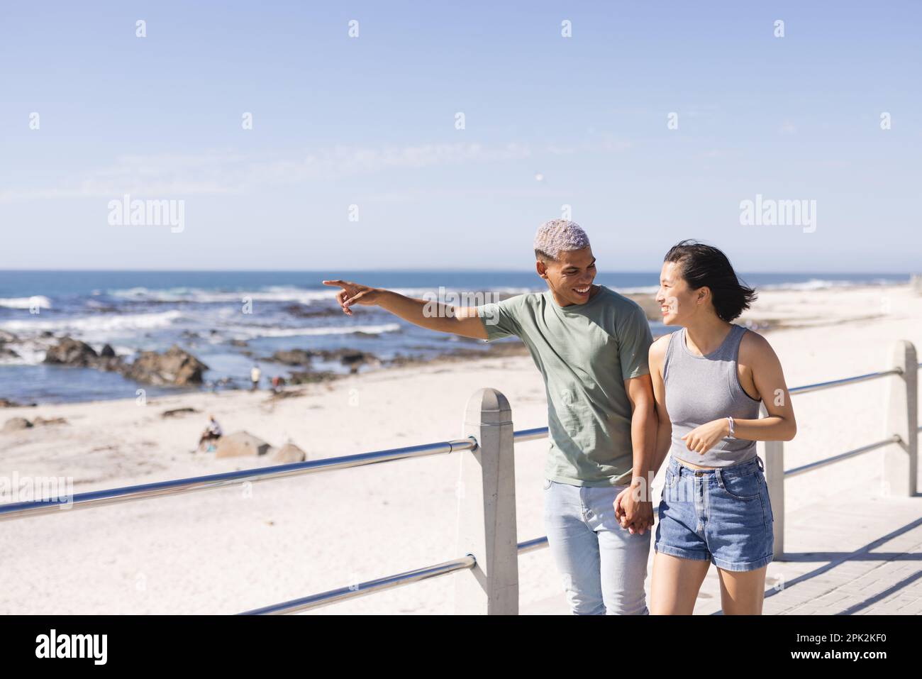 Cheerful young couple promenade hi-res stock photography and images - Alamy