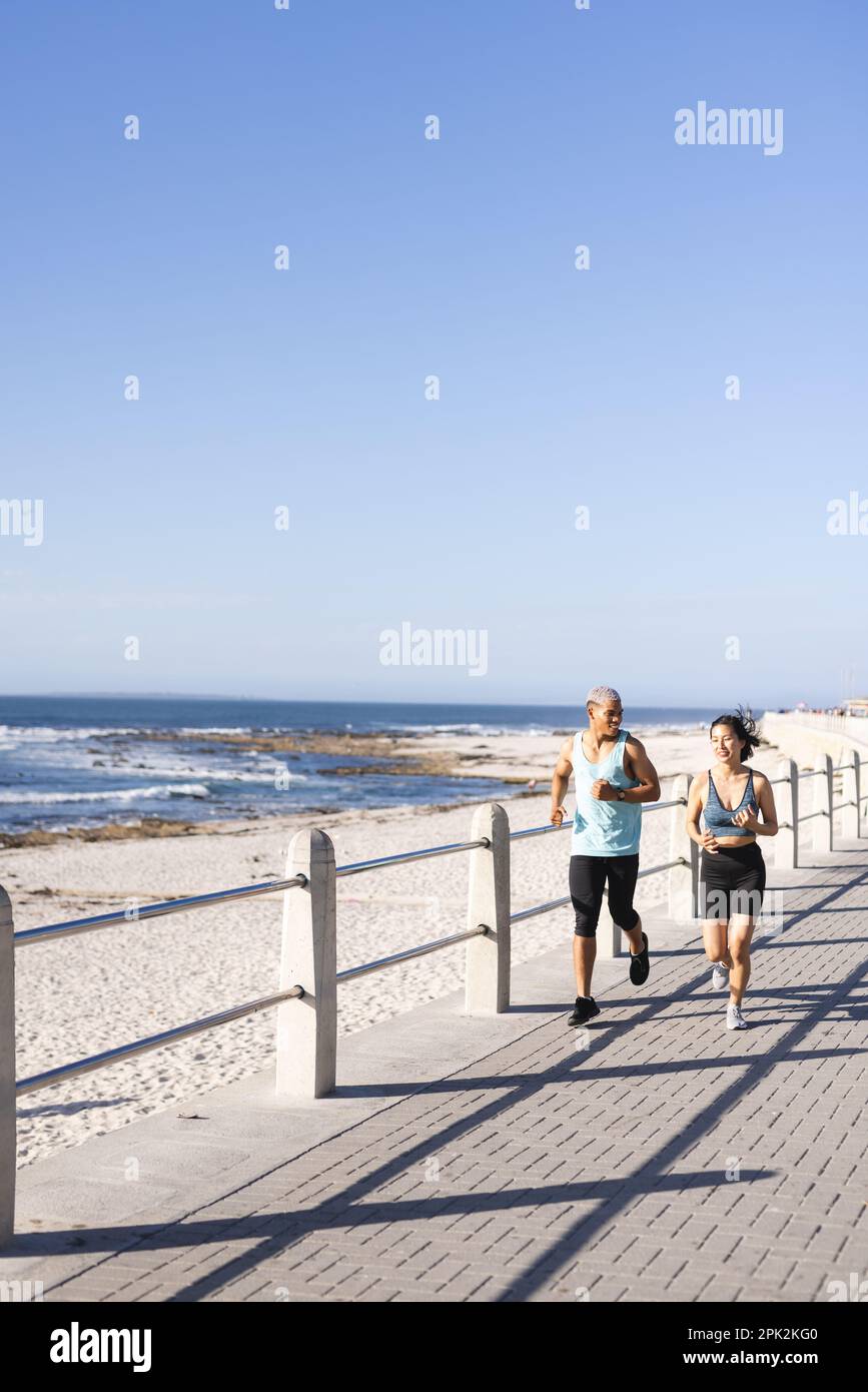 Diverse couple wearing holiday hi-res stock photography and images - Alamy