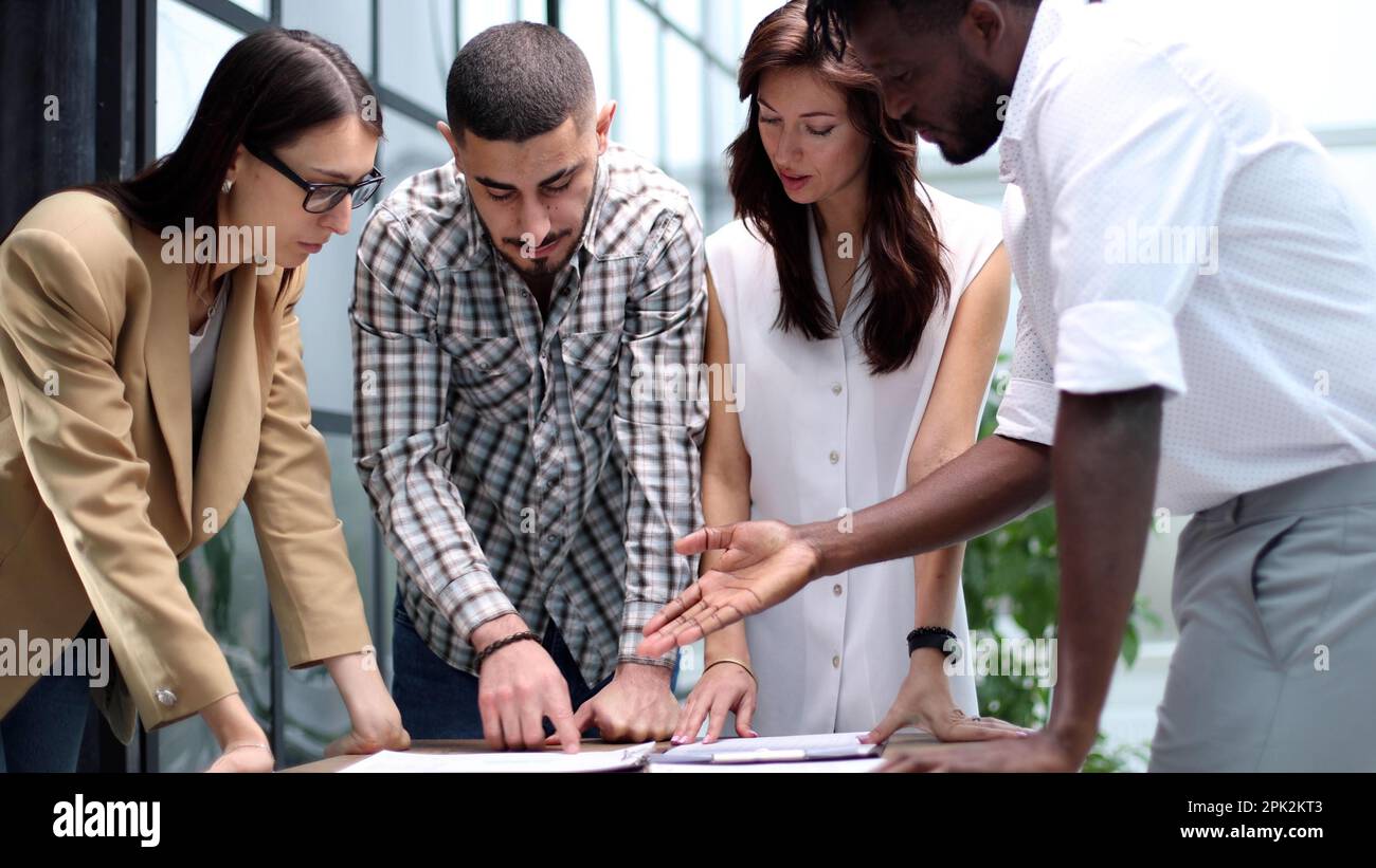 Office employees working on startup hi-res stock photography and images ...