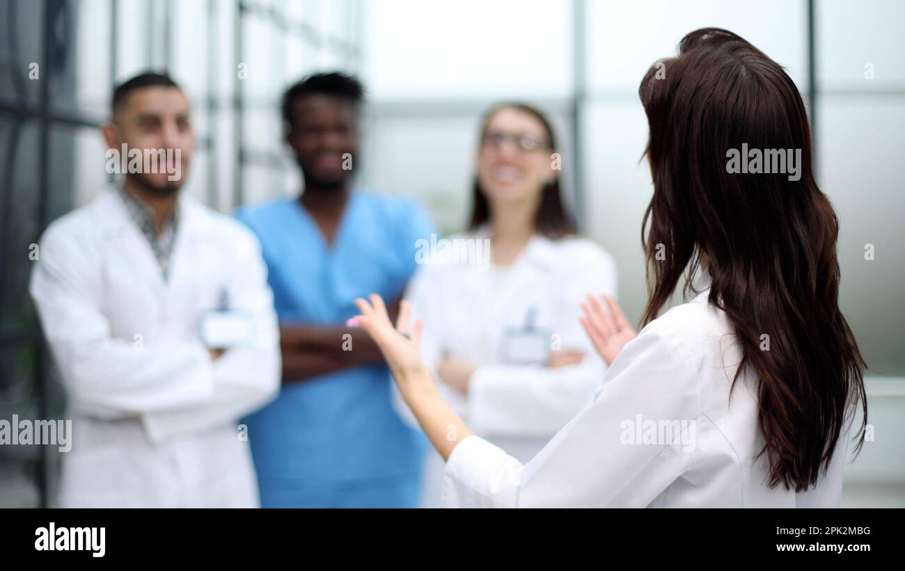 Group of medicine doctors talking during conference Stock Photo - Alamy