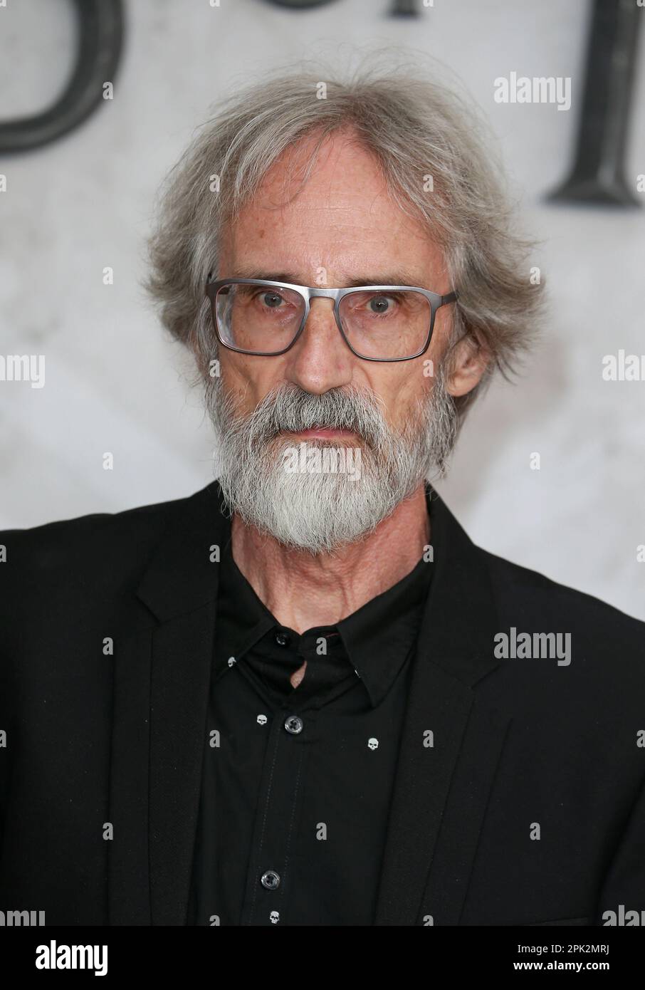 John Howe attends the World Premiere of "The Lord Of The Rings: The ...