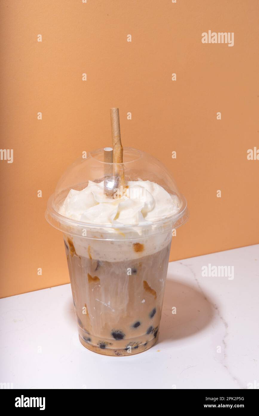 Tapioca boba balls coffee frappe, asian trendy cold coffee drink with ...