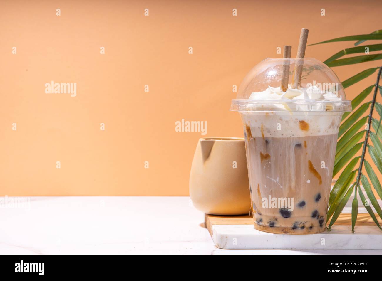 Tapioca boba balls coffee frappe, asian trendy cold coffee drink with ...