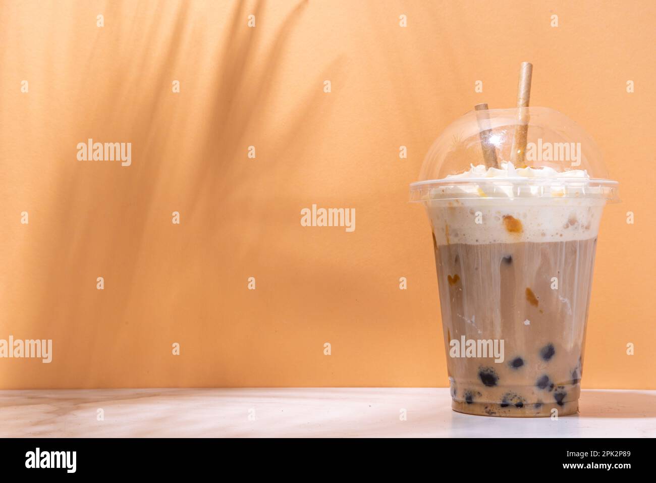 Tapioca boba balls coffee frappe, asian trendy cold coffee drink with ...