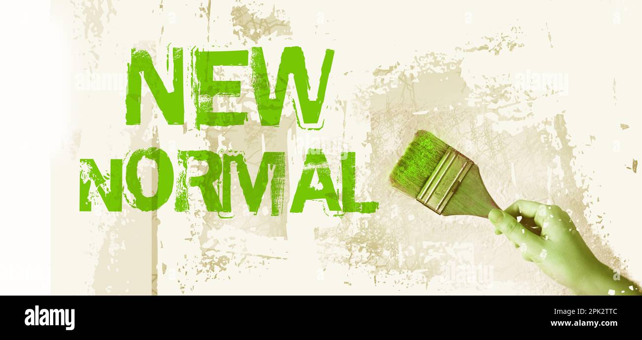 New normal words in red and brush in hand on grundge white grey ...