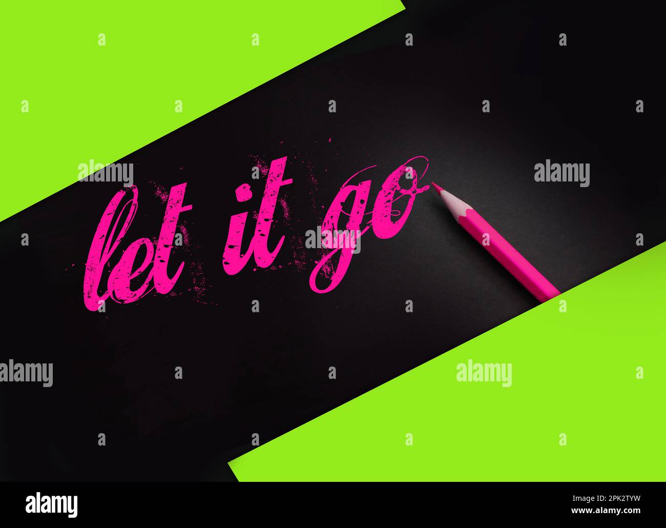 Let it go words written with a yellow pencil on black. Forgiveness ...