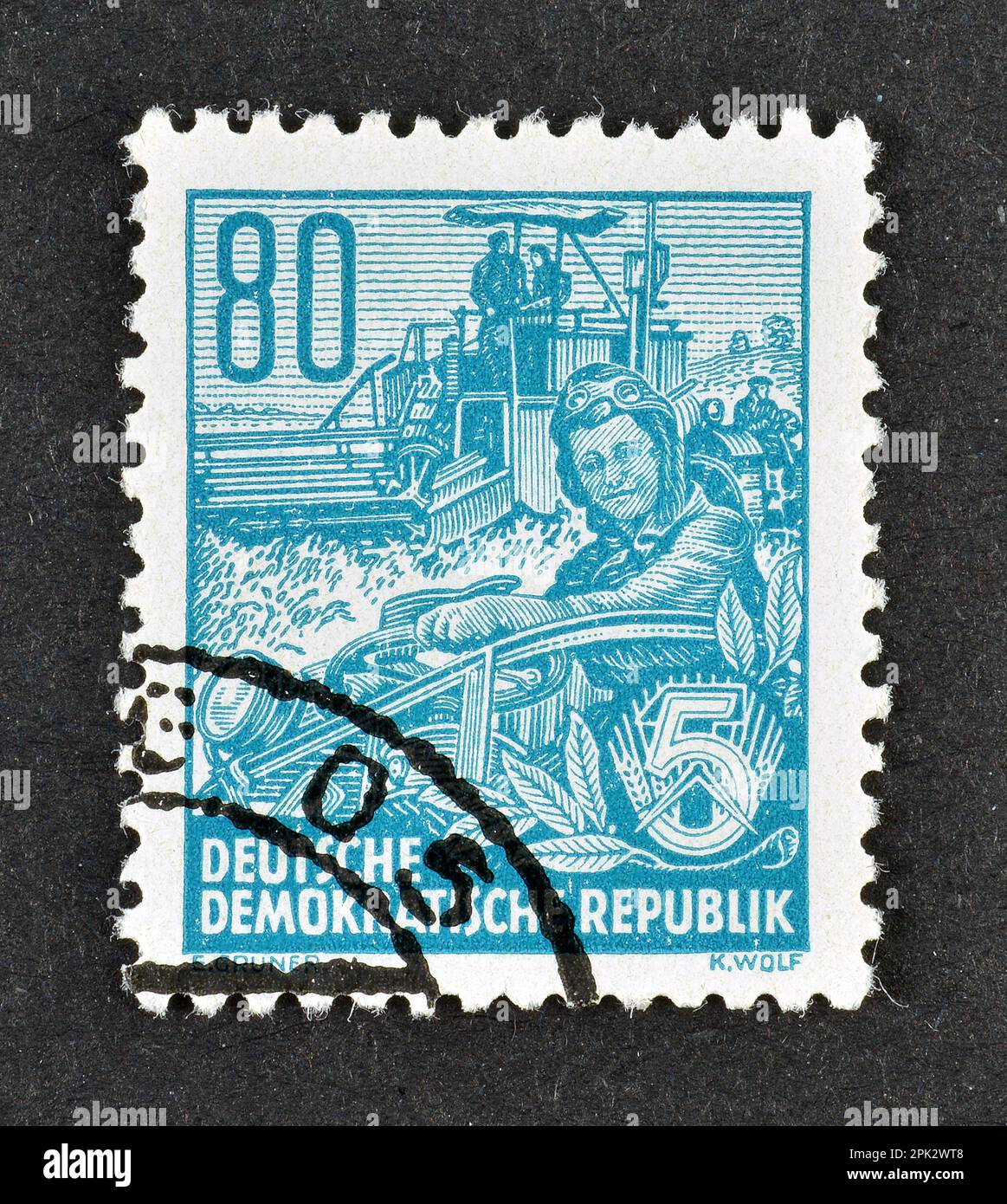 Cancelled postage stamp printed by East Germany, that shows Combine ...