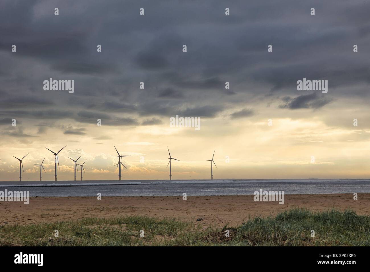 Wind turbines at sunrise uk hi-res stock photography and images - Alamy