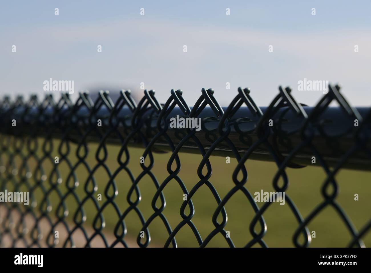 View of top part of a fence, photographed with shallow depth of focus ...