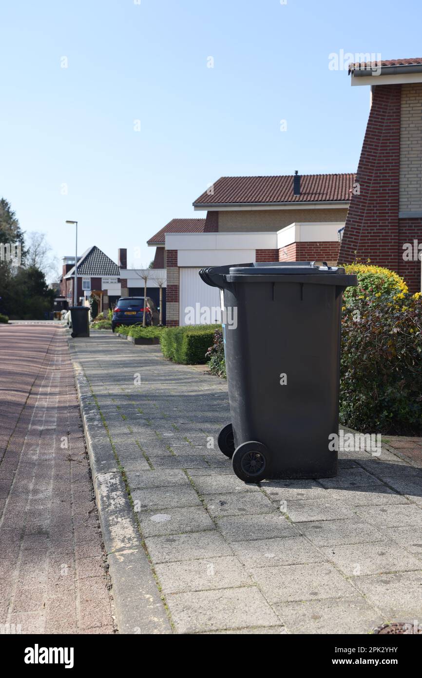 Plastic waste containers, a.k.a. kliko's (or wheelie bins), outside on ...
