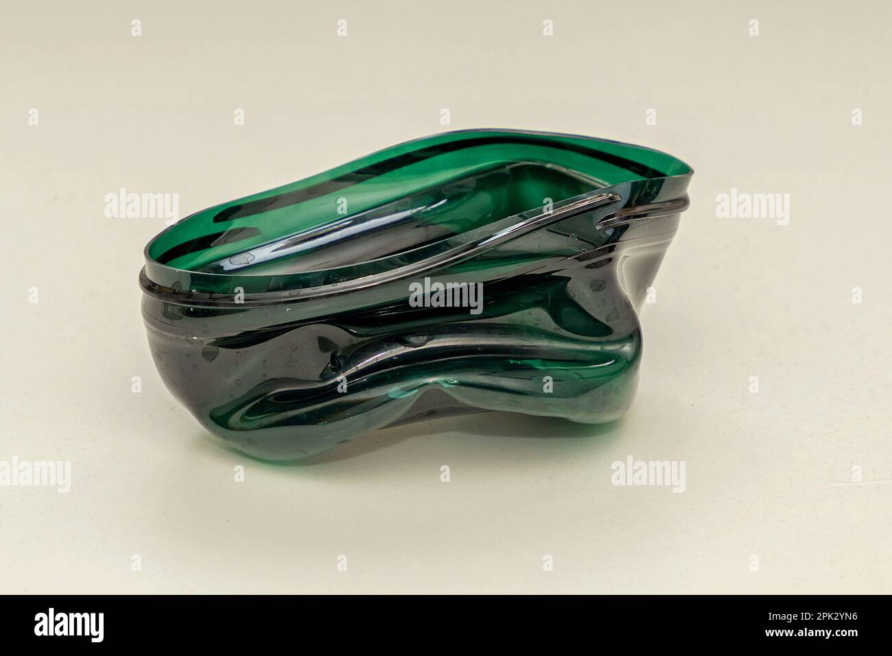 Melted deformed piece of plastic on white background ready for ...