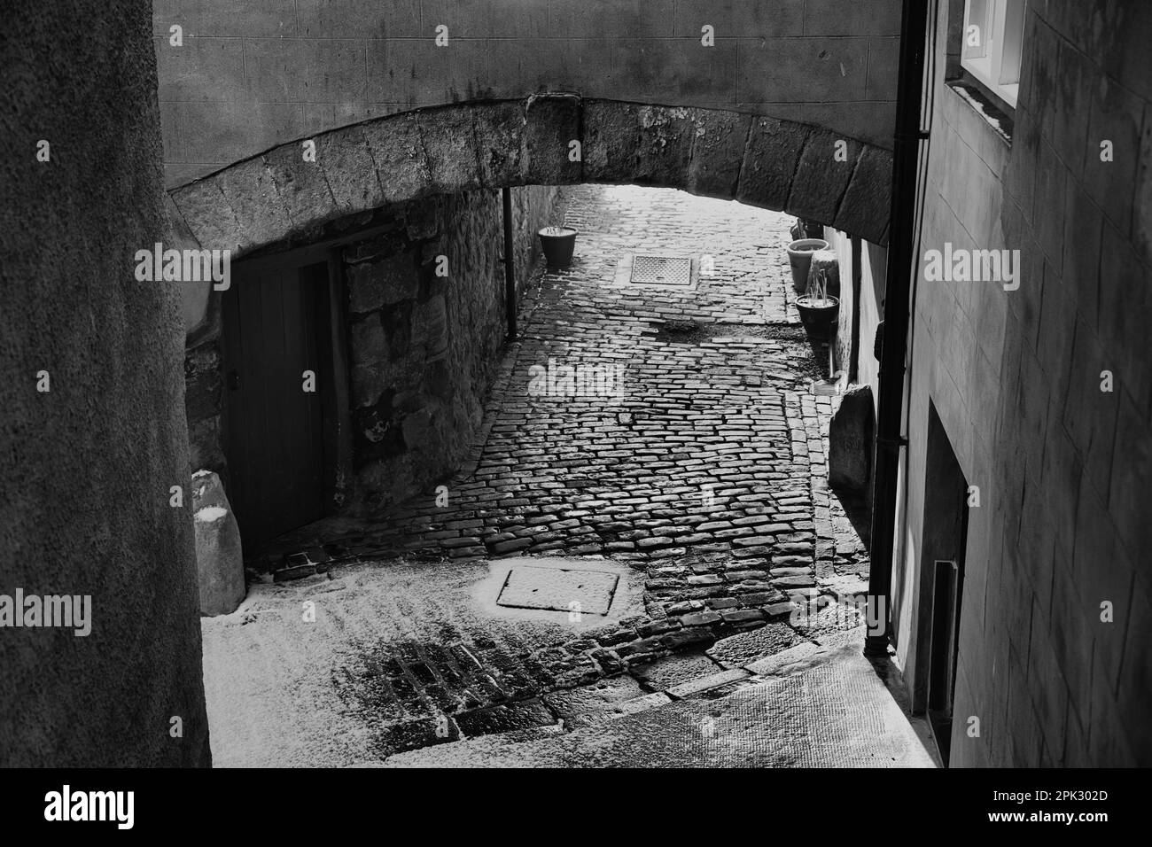 Under the archway Stock Photo - Alamy