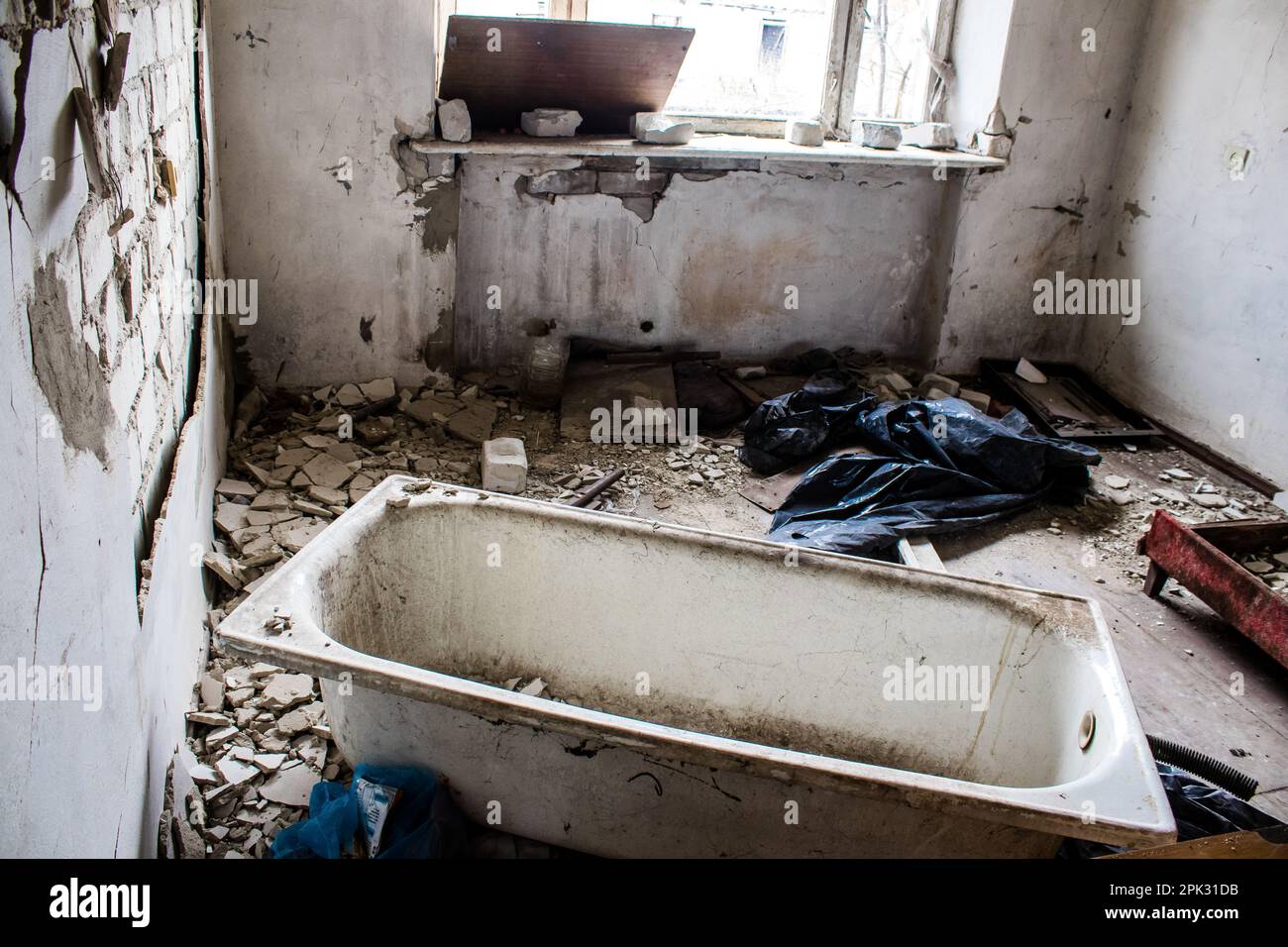 Interior of a house destroyed by a Russian bombardment. Objects of ...