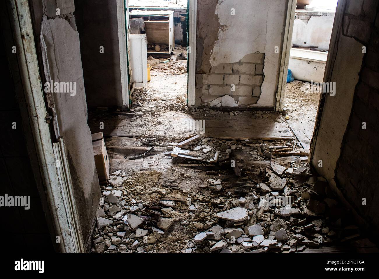 Interior of a house destroyed by a Russian bombardment. Objects of ...