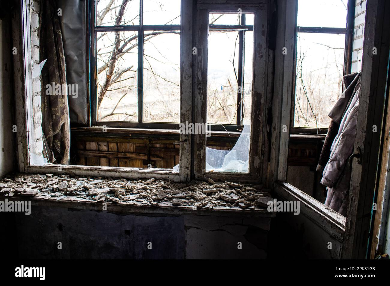 Interior of a house destroyed by a Russian bombardment. Objects of ...