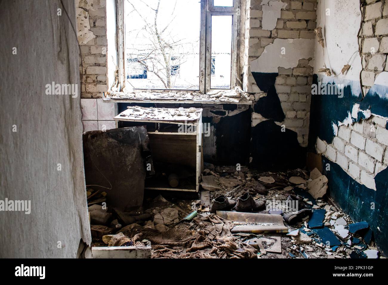 Interior of a house destroyed by a Russian bombardment. Objects of ...