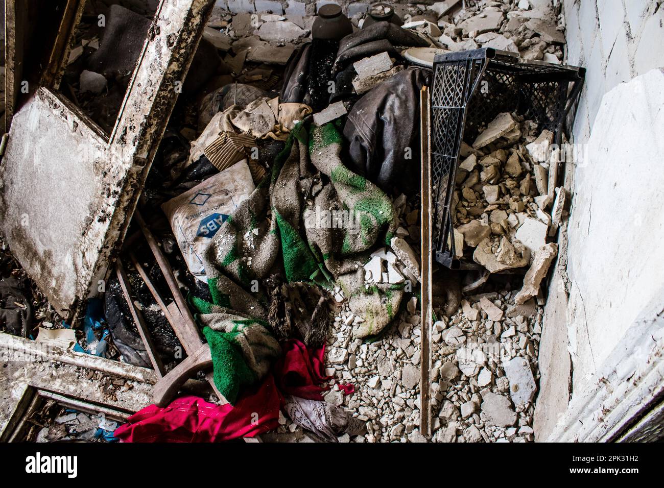 Interior of a house destroyed by a Russian bombardment. Objects of ...